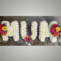 Mum letters with bright gerbera - Funeral Flowers Aberdeen